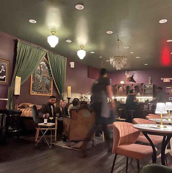 The energy of happy patrons enjoying craft cocktails in plush surroundings is what makes a speakeasy truly come alive at night.