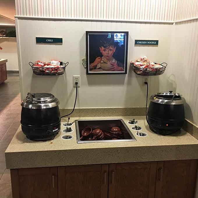 Two soup kettles standing ready like sentries of comfort, promising warmth in every ladle full of homemade goodness.