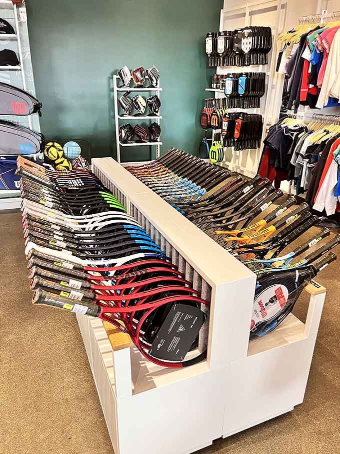 Vintage sewing machines lined up on rustic shelves create an unexpected museum vibe in the middle of retail paradise.