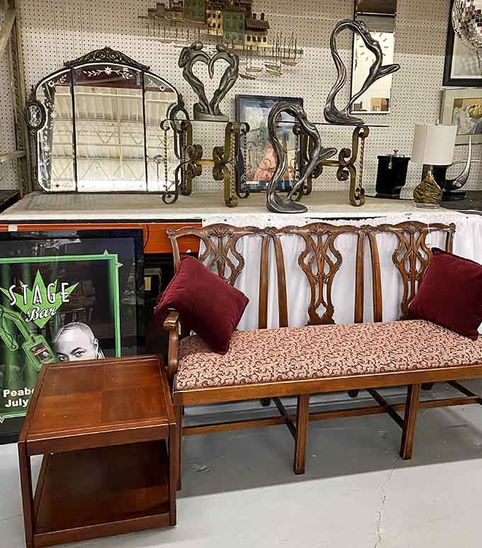 Elegant vintage furniture and ornate mirrors wait patiently for someone who appreciates craftsmanship over particle board and Allen wrenches.