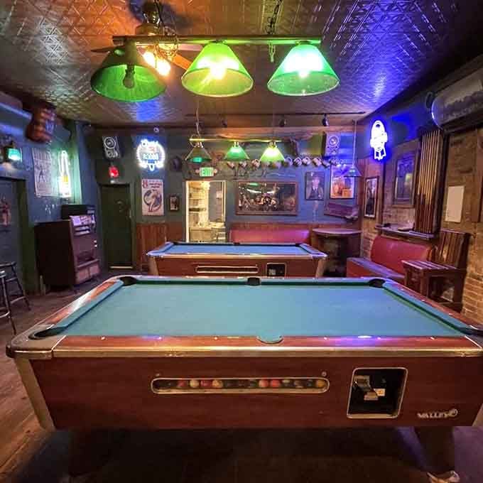 Pool tables under green-shaded lamps add another layer of entertainment, because apparently eating great food in a historic setting wasn't already enough fun for one visit.