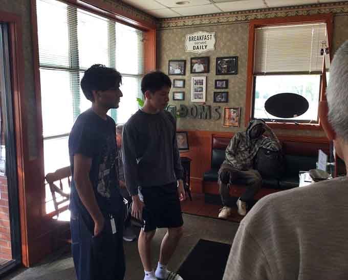 The waiting area with its homey touches and framed memories shows this place has been feeding the community well.