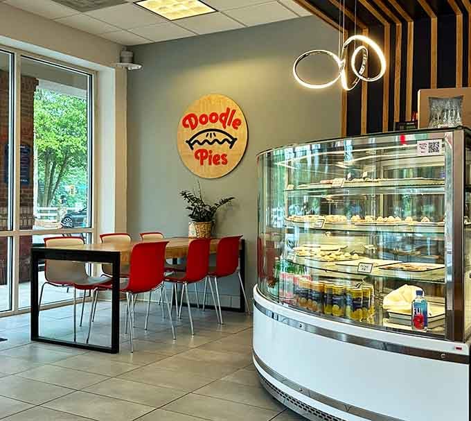 Clean lines, pops of red, and a wooden logo that screams "we're fun but also serious about pie."