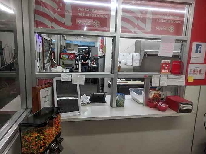 The order window where dreams are spoken aloud and delicious reality is handed back through the glass.