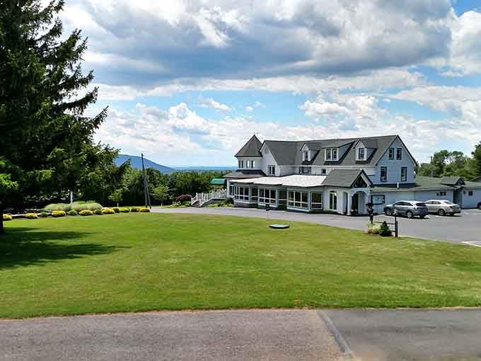 The country club sprawls across manicured lawns where your golf game can disappoint you in absolutely stunning surroundings.