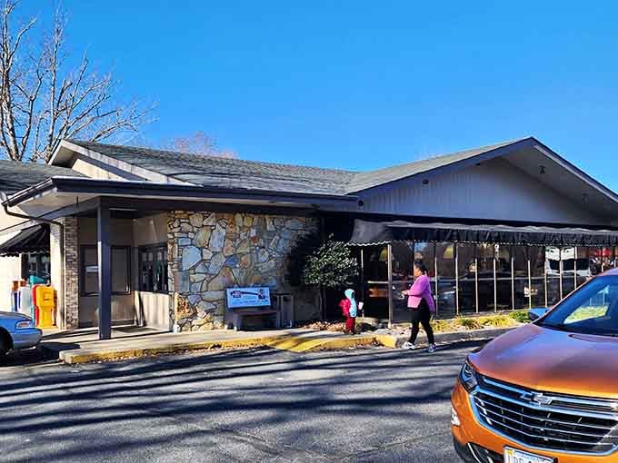 Stone and wood architecture blend beautifully at this community gathering spot where neighbors actually gather and talk.