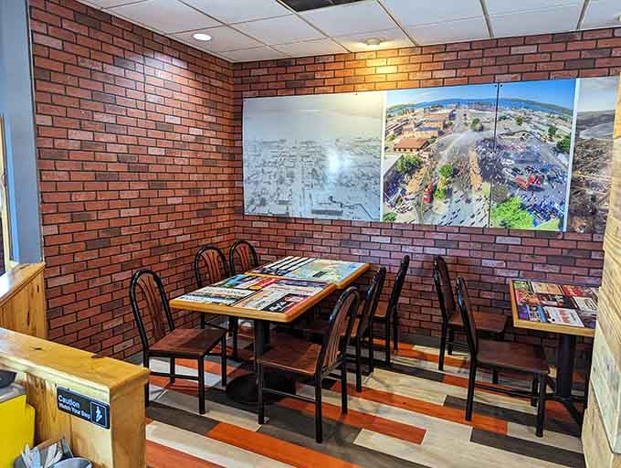 Brick walls and wooden tables create intimate dining nooks perfect for devouring burgers without the whole restaurant watching your technique.