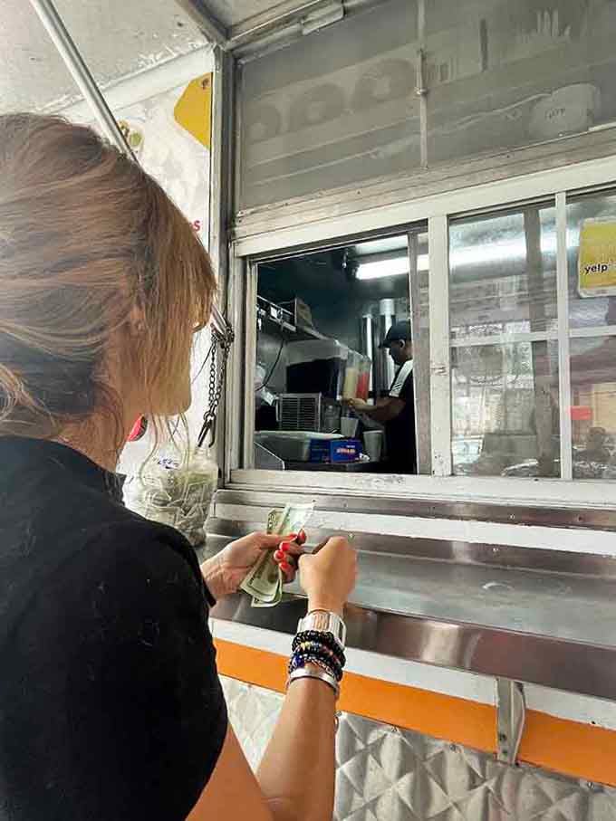 Real customers clutching real cash for real tacos, this is how food memories are made, friends.