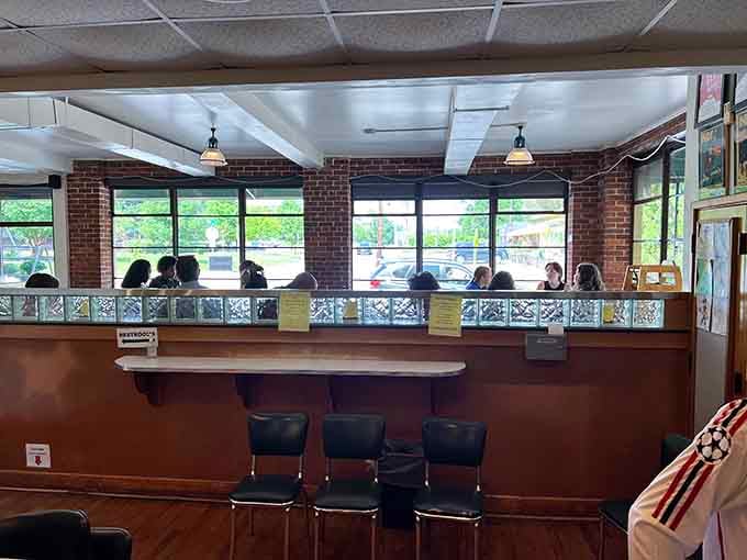 That entrance adorned with colorful stickers welcomes you like an old friend's front door, minus the awkward small talk.