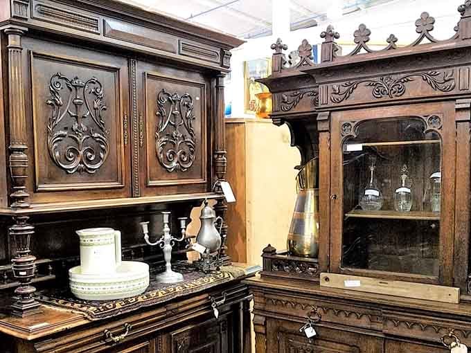 Ornate wooden cabinets that have seen more dinner parties than you've had hot meals, still standing proud.