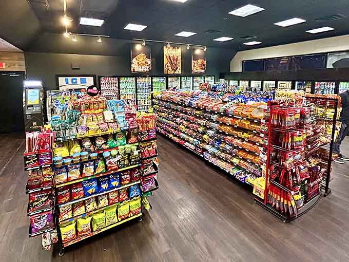 A fully stocked convenience store shares the space, because sometimes you need snacks and a gourmet burger simultaneously.