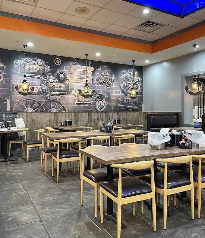 Steampunk-inspired wall art adds unexpected character to a space dedicated to serious eating endeavors and culinary exploration.