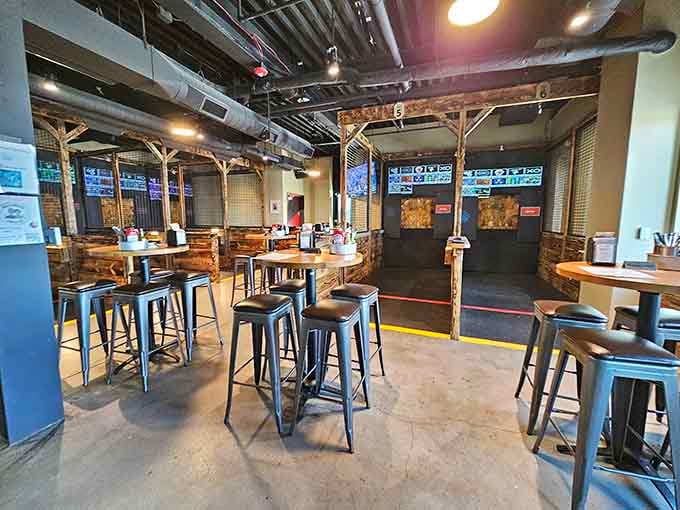 High-top tables and axe-throwing lanes create the kind of atmosphere where fun isn't optional, it's practically mandatory here.