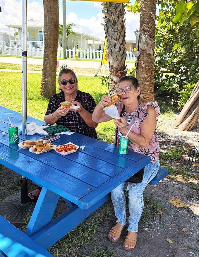 Pure joy captured in a single moment, proving that great hot dogs have the power to make any day better.