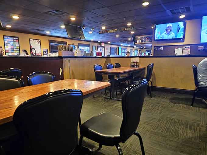 Booth seating with TVs overhead, so you never miss the game while demolishing your burger selection.