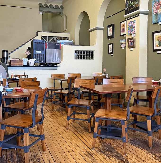 Arched doorways and wooden tables create that perfect balance between fancy enough and comfortable enough to really enjoy yourself.