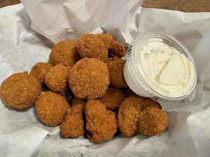 Golden fried mushrooms with ranch dressing, because sometimes the best things in life are simple and crispy.