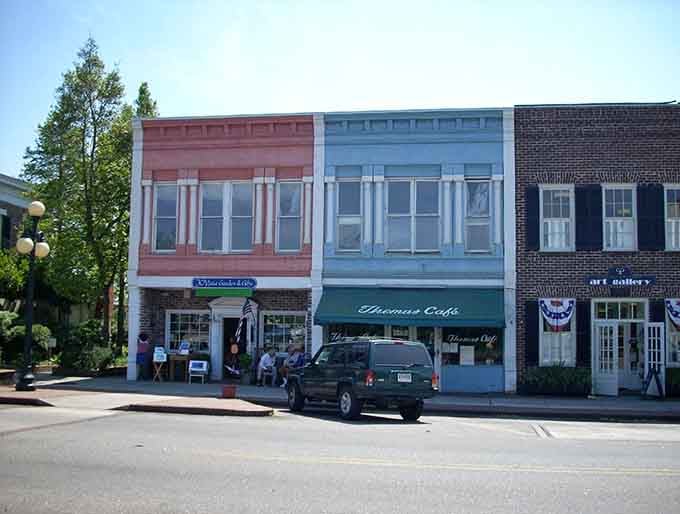 These pastel storefronts look like they escaped from a 1950s postcard and decided Georgetown was worth staying for.