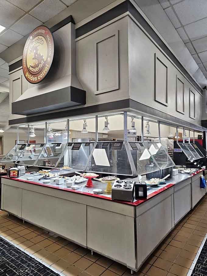 The dessert bar stretches out like a sweet dream, offering more choices than any reasonable person needs.