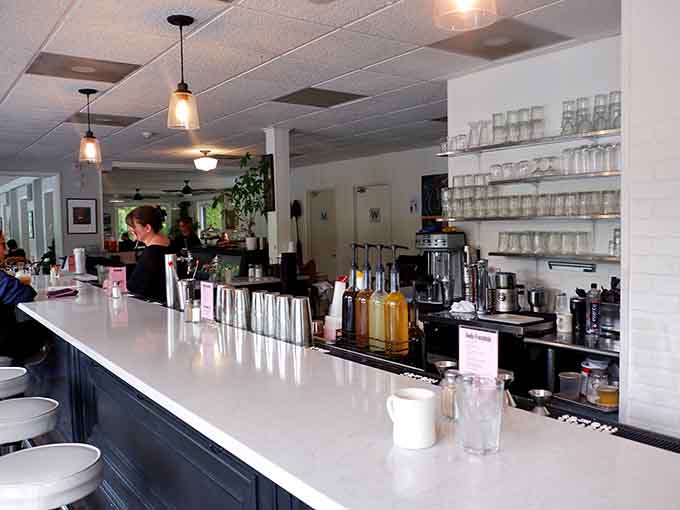 The gleaming counter and organized shelves reveal a kitchen that takes pride in every single plate that goes out.