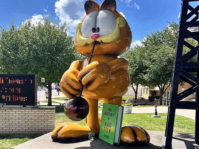 Garfield tries his paw at glass blowing, creating art that's probably more fragile than his patience level.