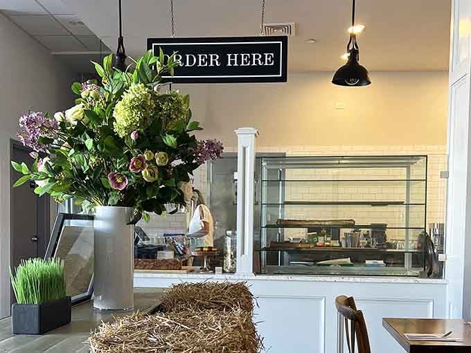 Fresh flowers and an ordering window that frames your upcoming lunch like the masterpiece it truly is.