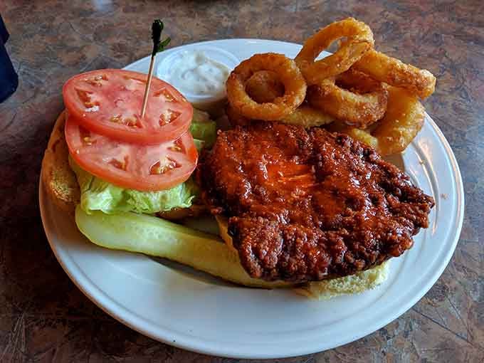 Buffalo chicken sandwich with onion rings delivers that perfect combination of heat, crunch, and immediate satisfaction.
