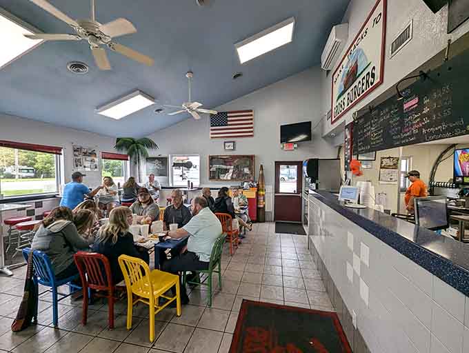 Real people enjoying real burgers in a real restaurant, which is increasingly rare in our automated world today.