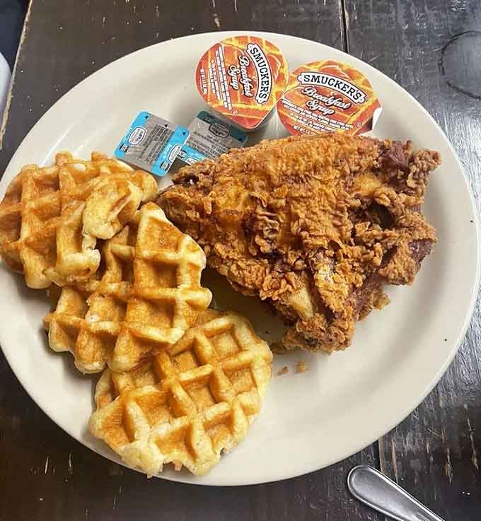 Chicken and waffles with a side of jelly, because sweet and savory together is culinary genius.