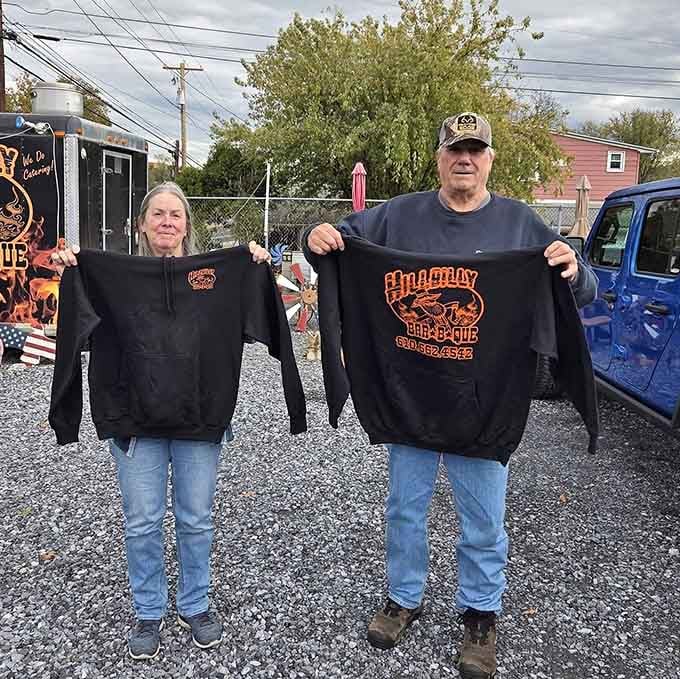 Proud fans showing off their Hillbilly BBQ sweatshirts, because when you love a place, you wear it.