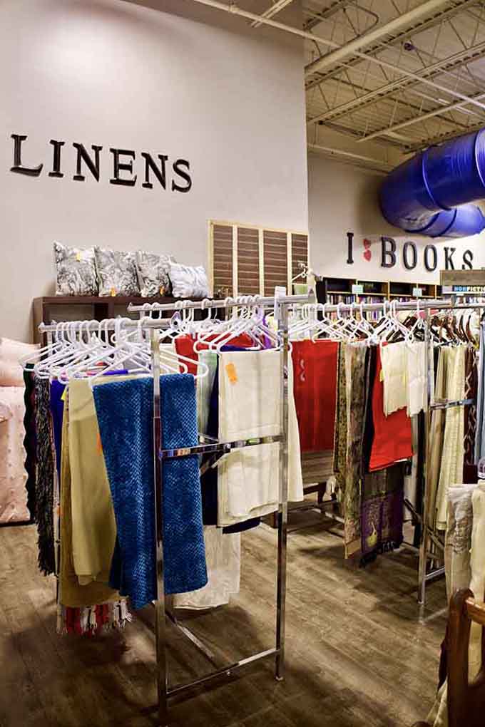 The linens section proves that dressing your windows and tables beautifully doesn't require winning the lottery first.