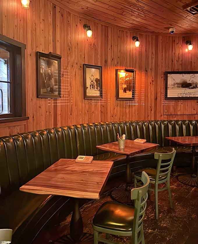 Vintage photographs and green leather booths create an atmosphere that's equal parts nostalgic charm and quirky California cool.