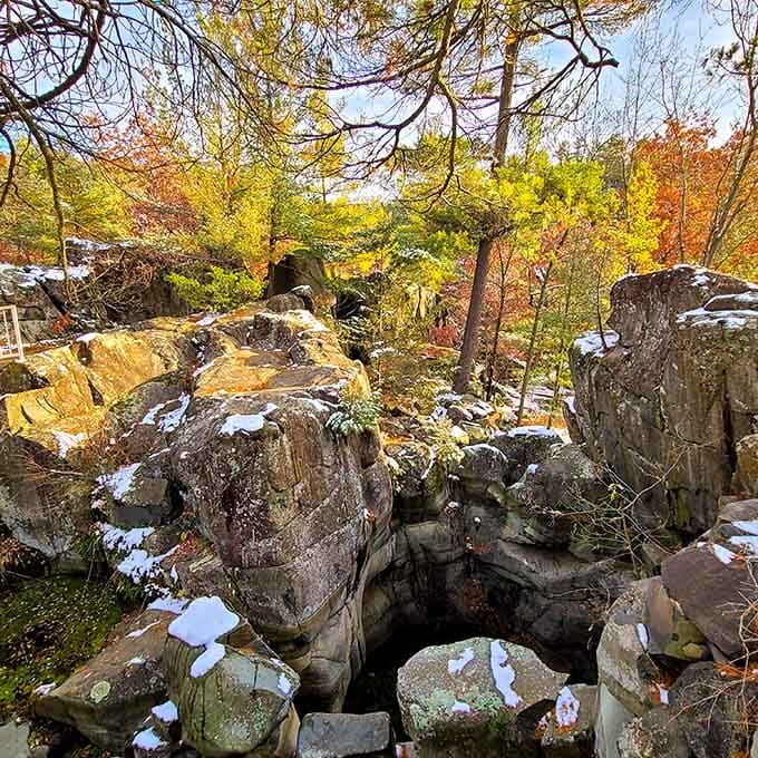 Winter's first snow dusts the potholes like powdered sugar on nature's stone donuts, sweet and surprisingly photogenic.