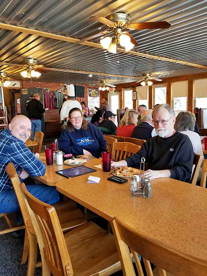 Real people enjoying real pizza in a real former jail; this is exactly what community dining should look like.