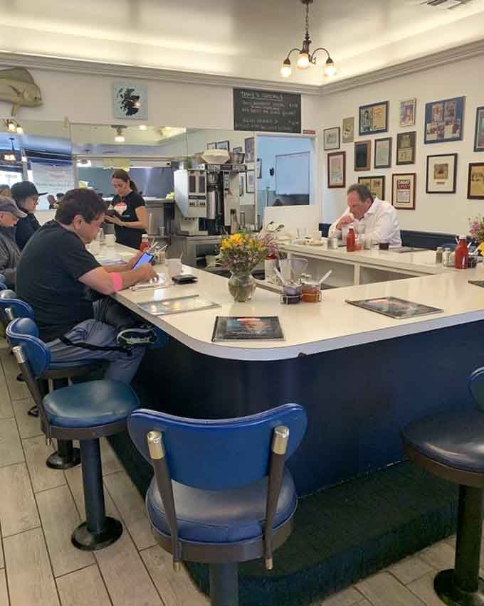 The counter seating offers front-row views of breakfast magic happening, plus faster coffee refills for the impatient.