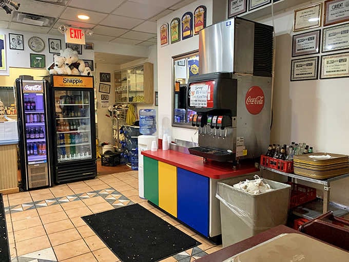 The rainbow-colored beverage station brings a splash of joy to a space that's already overflowing with personality and character.
