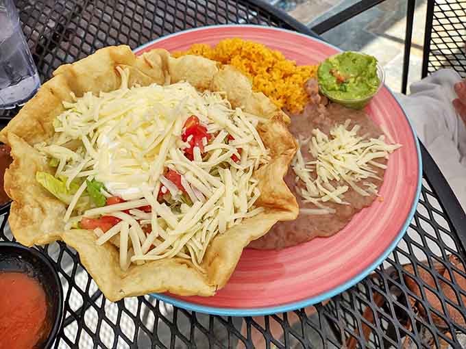 That crispy taco salad bowl cradles fresh ingredients like a edible treasure chest, making salad feel like an actual indulgence.