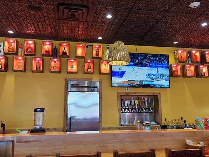 The bar area features decorative niches that look like tiny shrines dedicated to the art of good tequila.