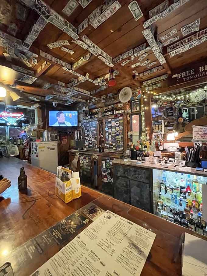 The bar area gleams with personality, dollar bills on the ceiling and enough character for three establishments.