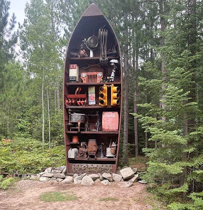 A boat standing at attention like a soldier, repurposed into a quirky display case for treasures and trinkets.