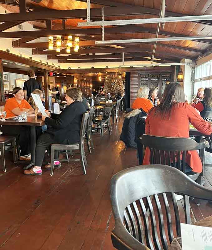 Cozy seating create an atmosphere where lingering over another drink feels absolutely mandatory, not optional.