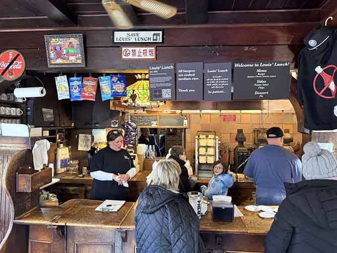 The counter where countless burgers have been assembled is a working monument to consistency and quality over decades.