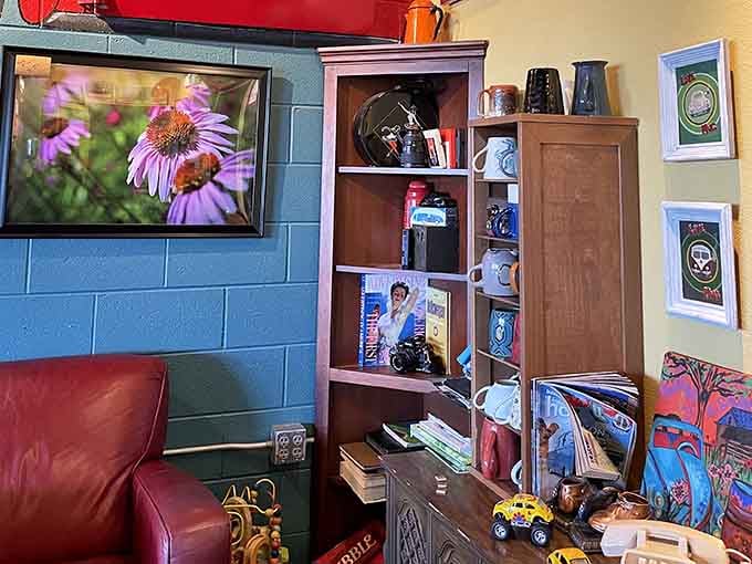 Every shelf and wall tells a story with vintage radios, colorful art, and Beatles memorabilia creating visual candy everywhere.