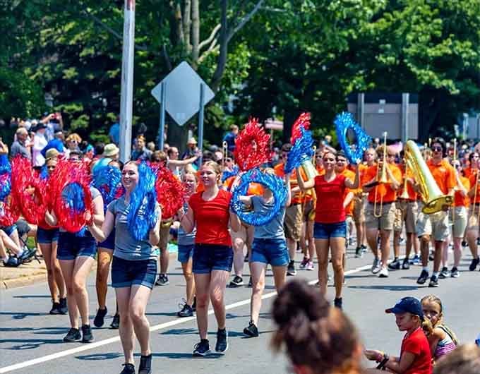 Summer parades with pom-poms and enthusiasm prove small towns throw better parties than cities with ten times the budget.