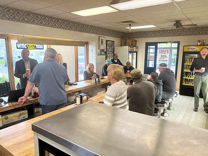 The breakfast crowd knows what's up, gathering at Luke's Donut Shop Inc before the good stuff disappears into happy bellies.