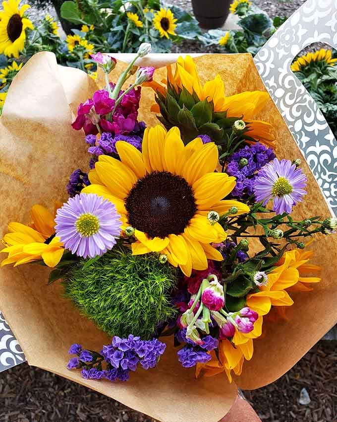 A bouquet that looks like summer decided to throw itself a going-away party with every color in the crayon box.