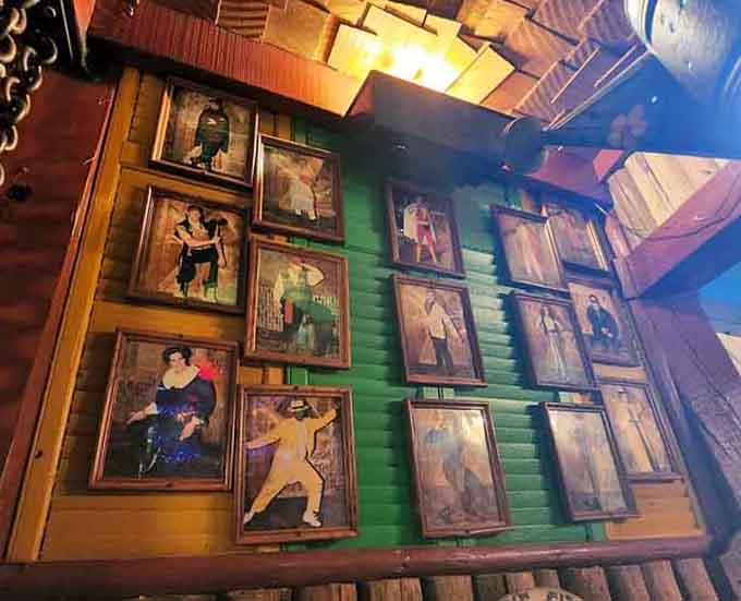 Wall art that spans decades and genres, creating a visual timeline of pop culture nobody asked for.