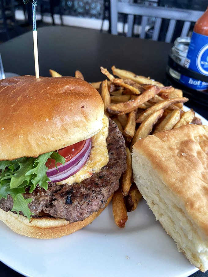 A juicy burger with fries and a biscuit on the side means lunch doesn't play second fiddle here.