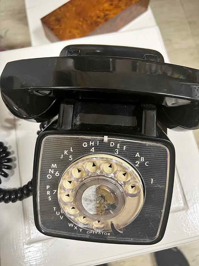 That rotary phone dial brings back memories of actually memorizing numbers and busy signal frustrations.
