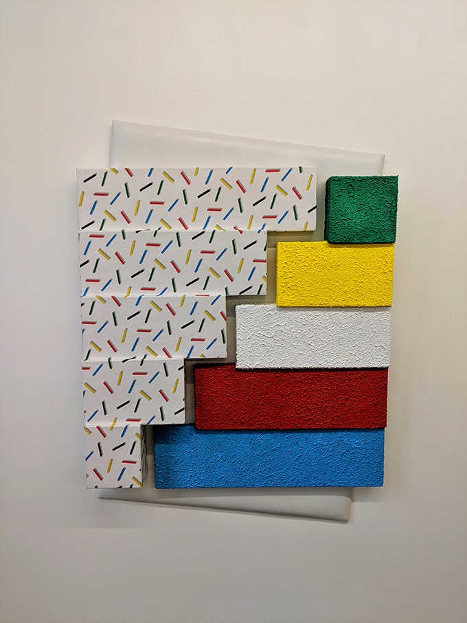 Textured blocks of color stacked like a sophisticated game of Jenga designed by a minimalist with excellent taste.